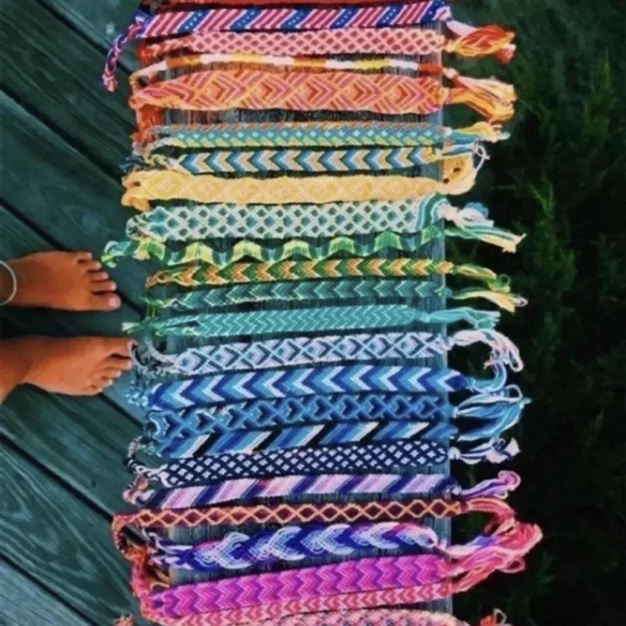 I make string friendship bracelets. *photos not... - Depop