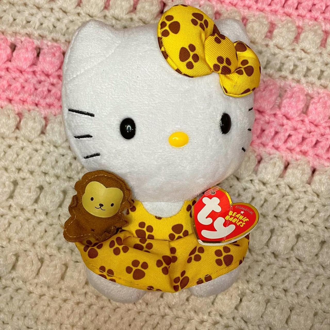 Yellow jungle hello kitty, tags still attached... - Depop