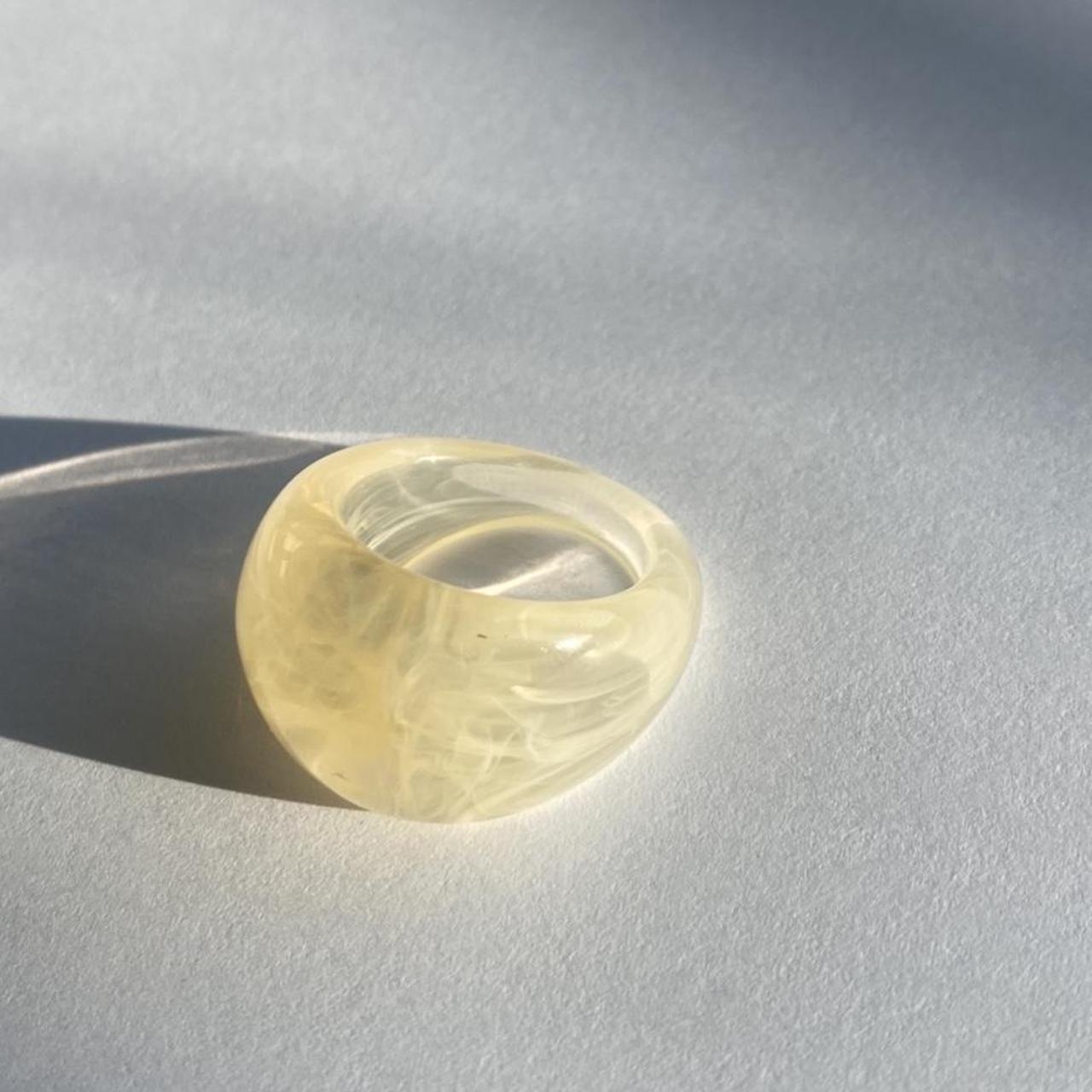 Extremely gorgeous yellow round size 7 resin ring... - Depop