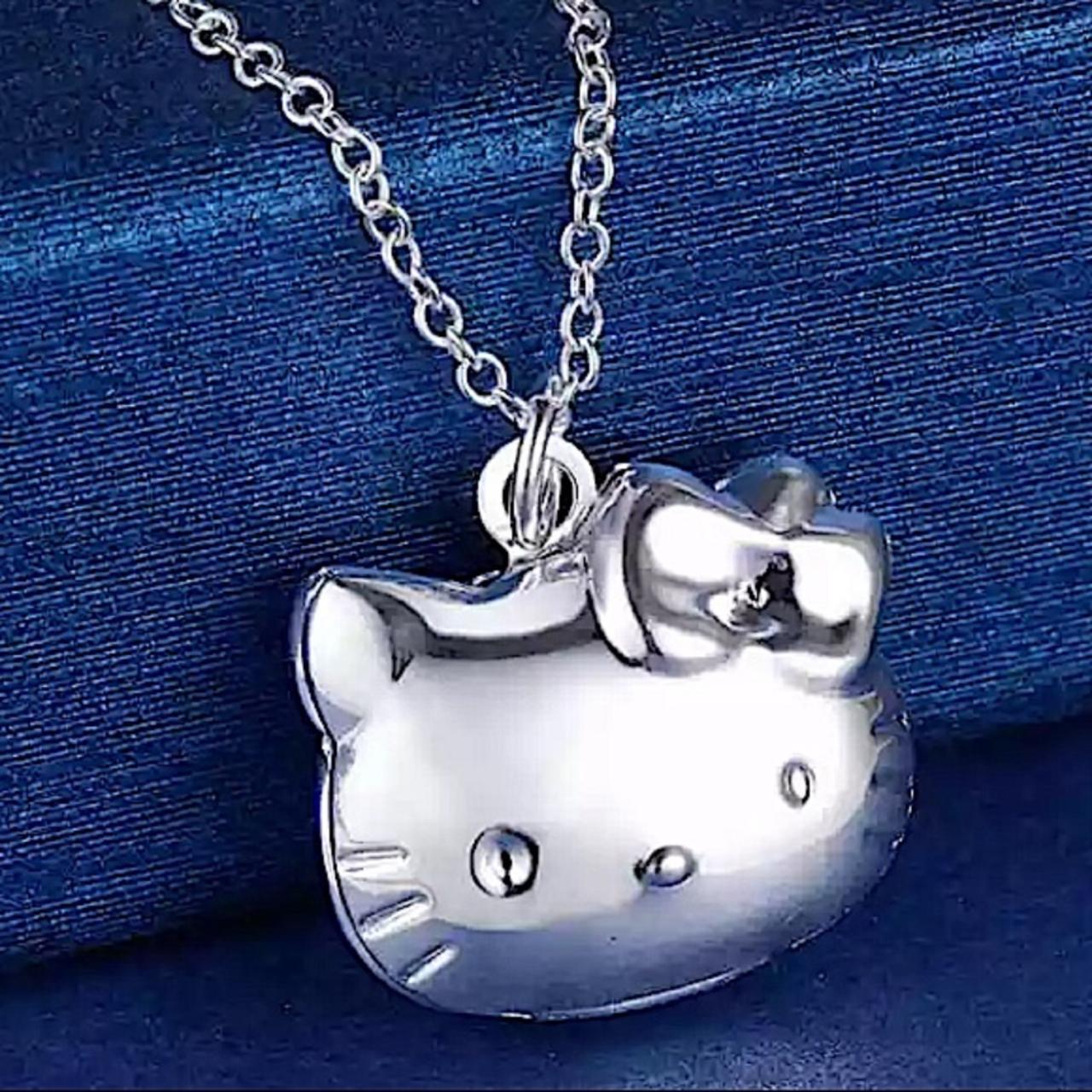 Sterling Silver Hello Kitty Locket... - Depop
