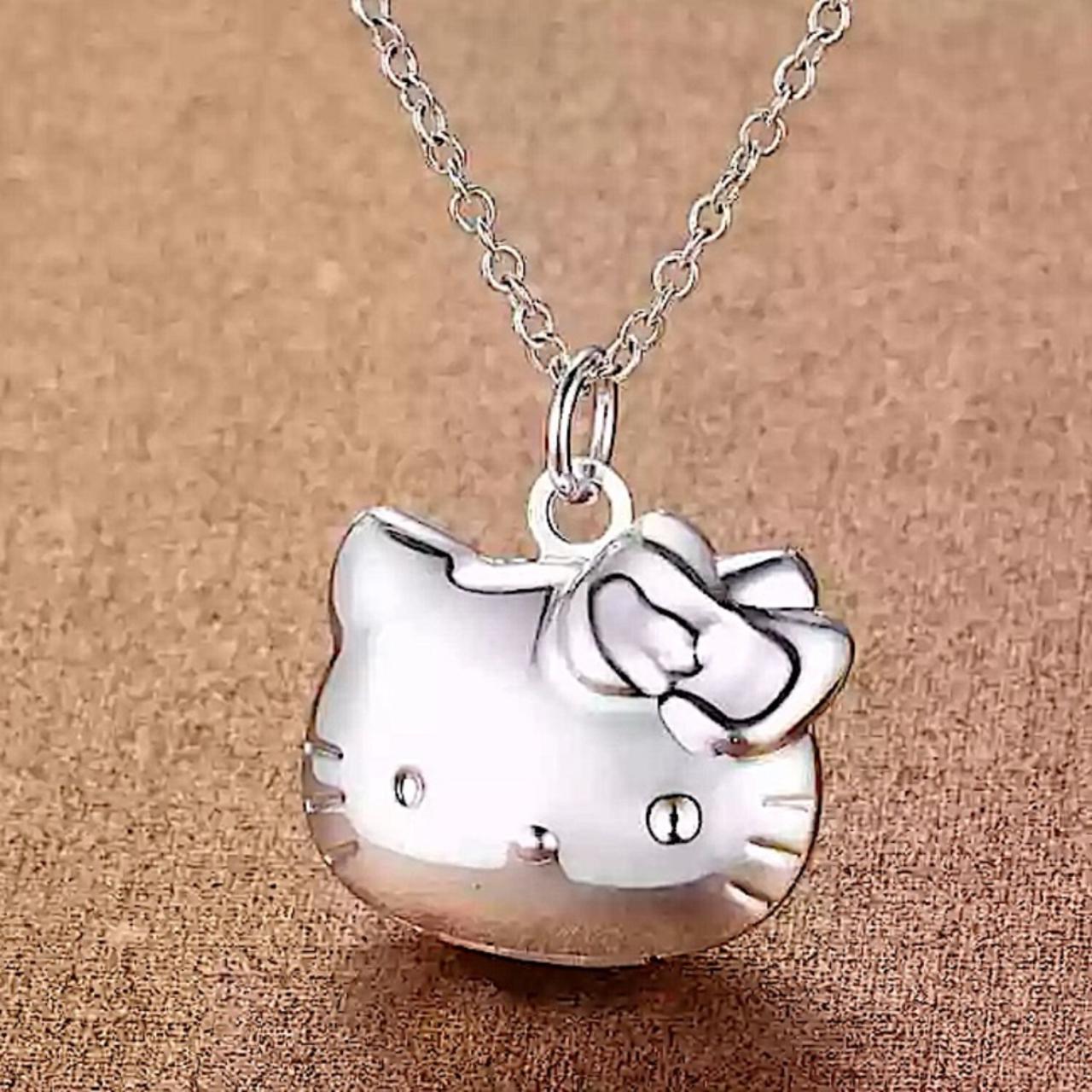 Sterling Silver Hello Kitty Locket... - Depop
