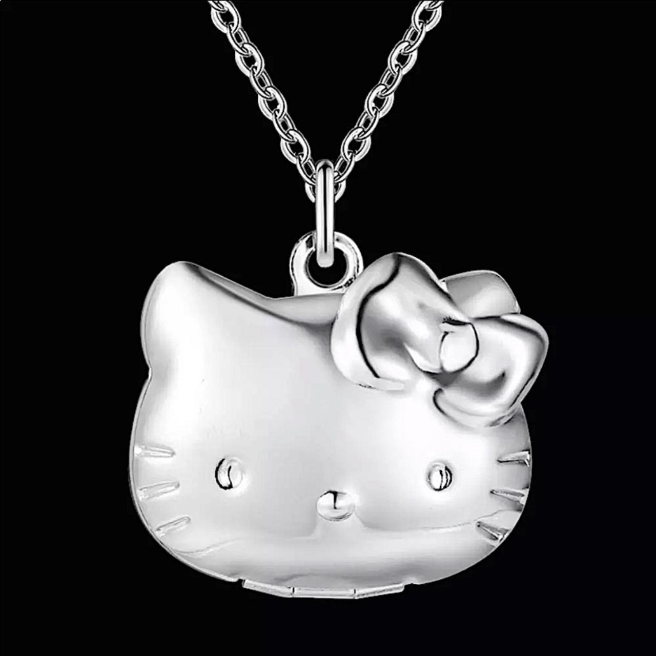 Sterling Silver Hello Kitty Locket... - Depop