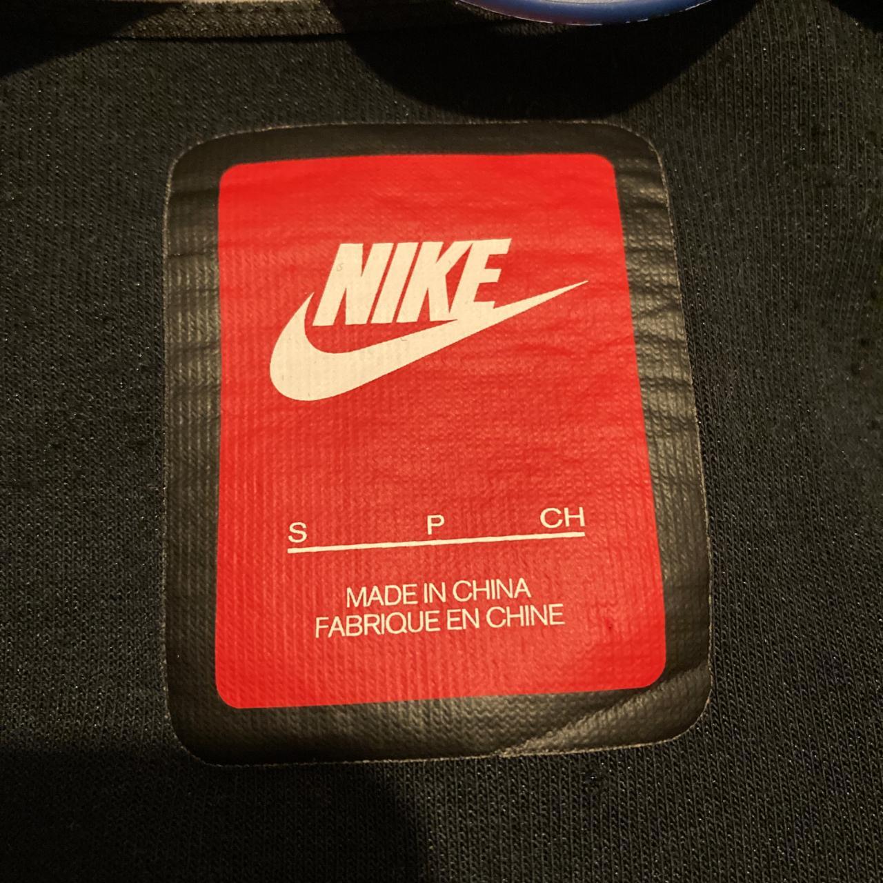 Nike Tech Fleece hoodie on red tags Black with... - Depop