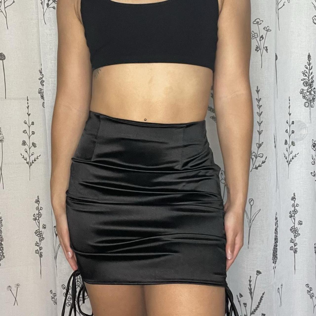 black mini skirt with adjustable side strings. make... - Depop