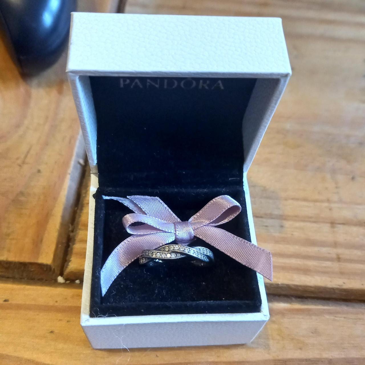 Lovely silver coloured ring from Pandora. Fits in my... - Depop