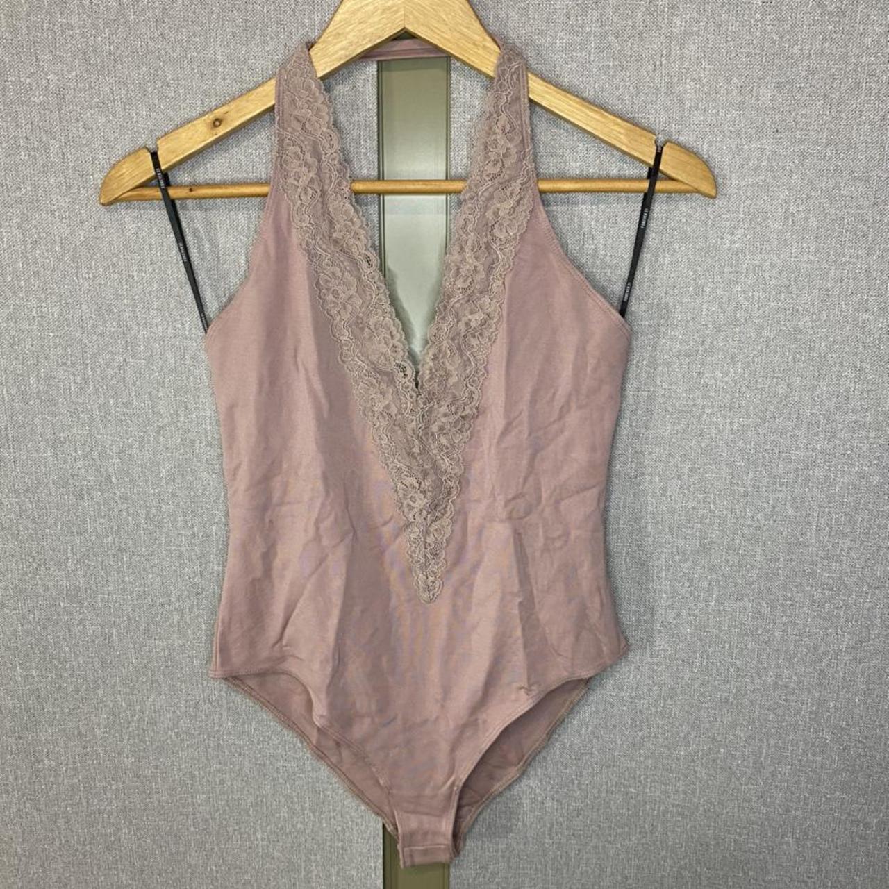 Forever 21 - Deep Cut Halter Neck Bodysuit / Pink... - Depop