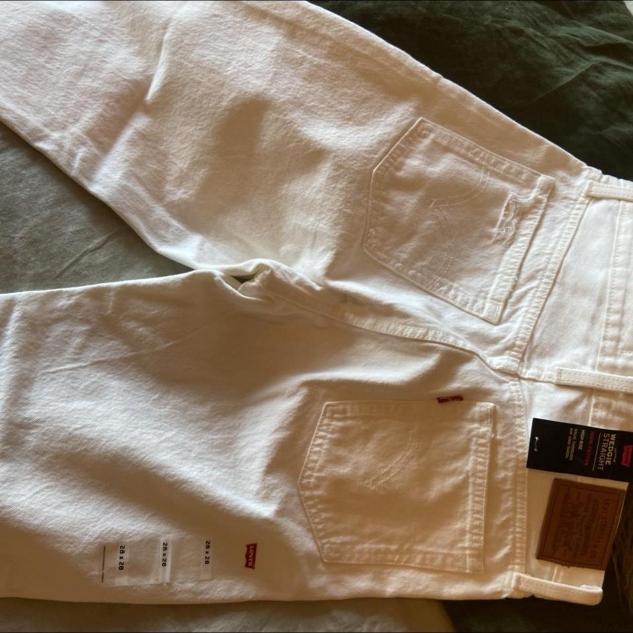 Brand new white Levi’s jeans. This pair is a... - Depop