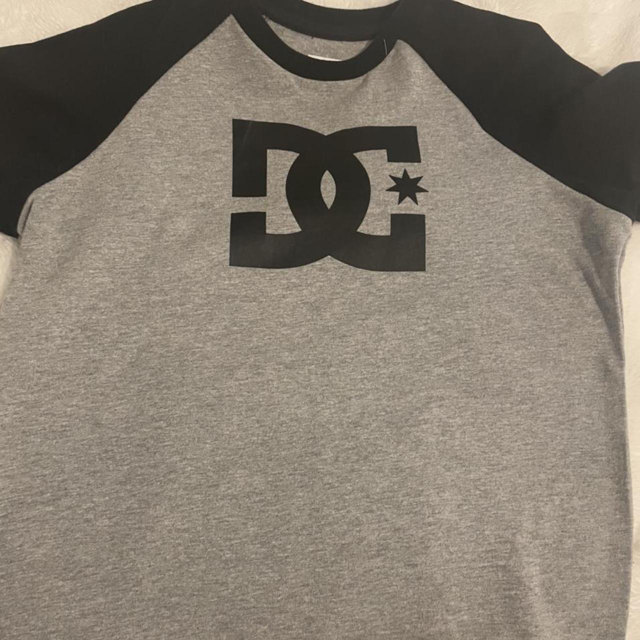 DC star grey and black top Fits a size small... - Depop