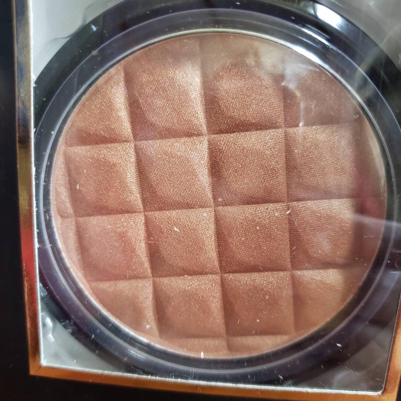 SUNLIT BRONZER illuminating bronzer with a... - Depop