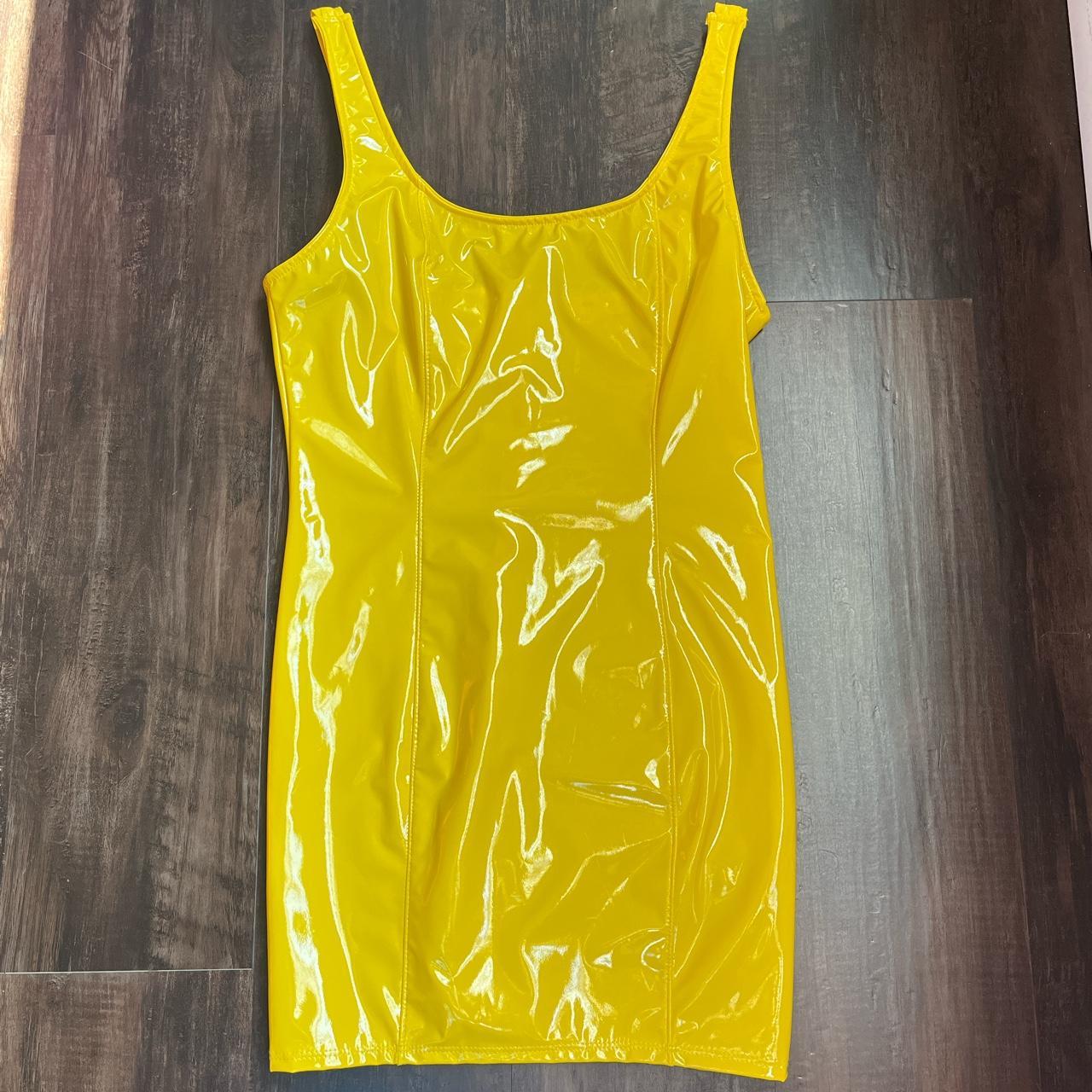 DollsKill yellow bodycon Vinyl dress Purchased from... | Depop