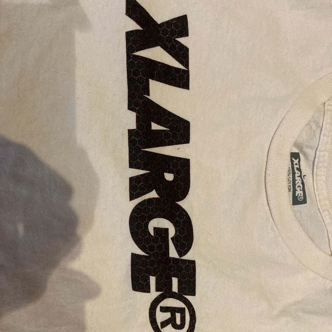 WHITE AND BALACK XLARGE TEE. SAYS LARGE BUT FITS... - Depop