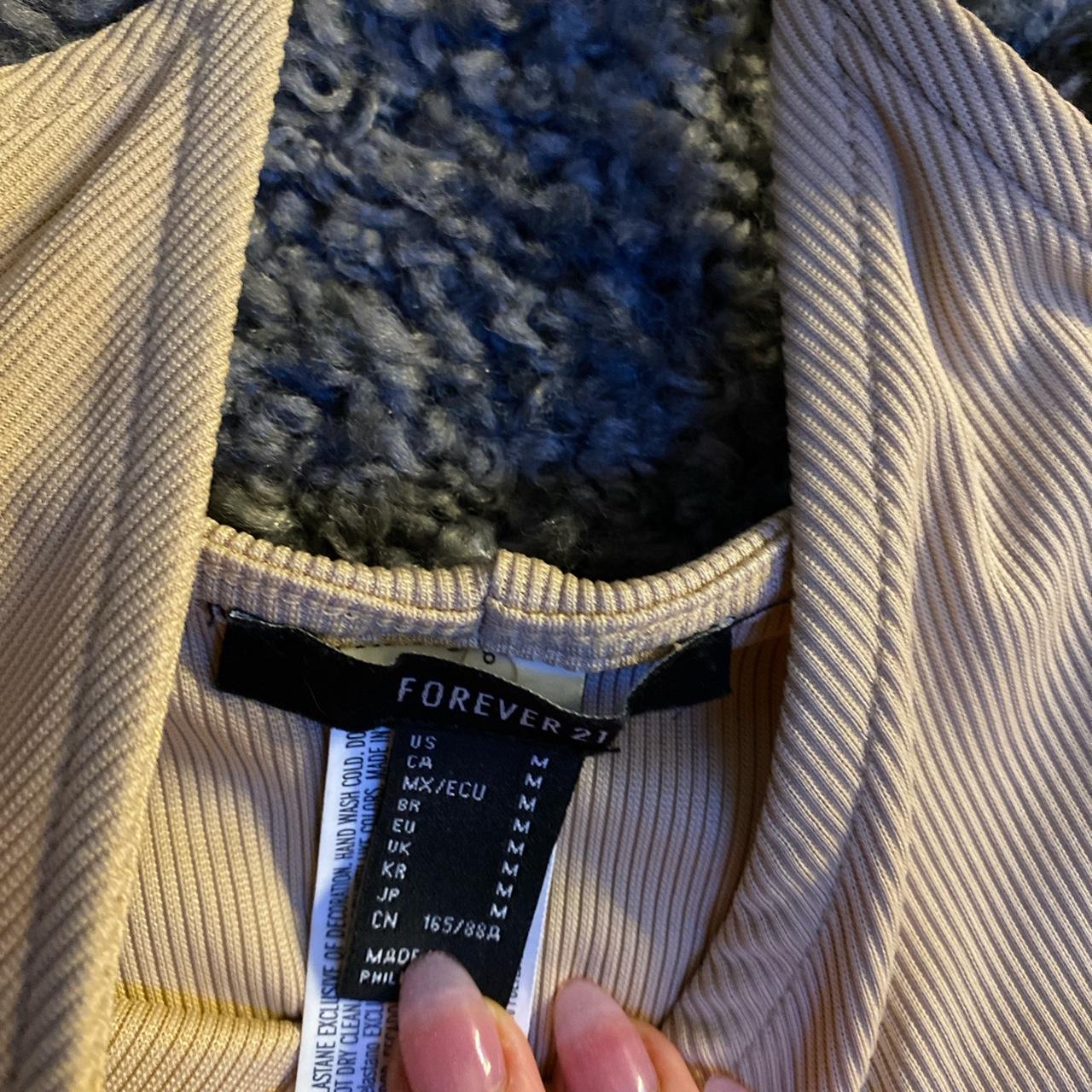 Nude forever 21 body suit with lace up sides. Never... - Depop