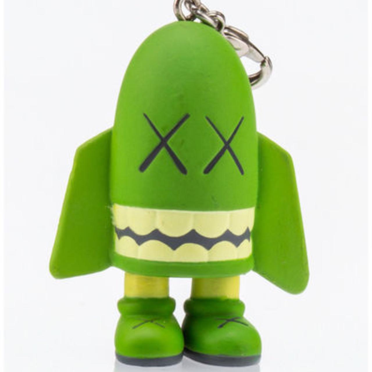 Kaws Blitz keychain 100% New very rare - Depop
