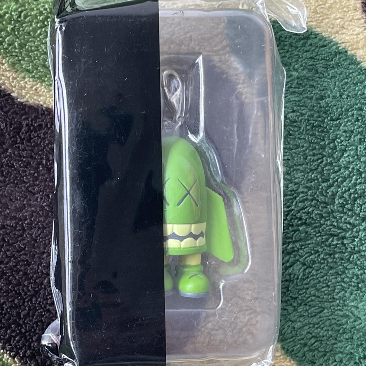 Kaws Blitz keychain 100% New very rare - Depop