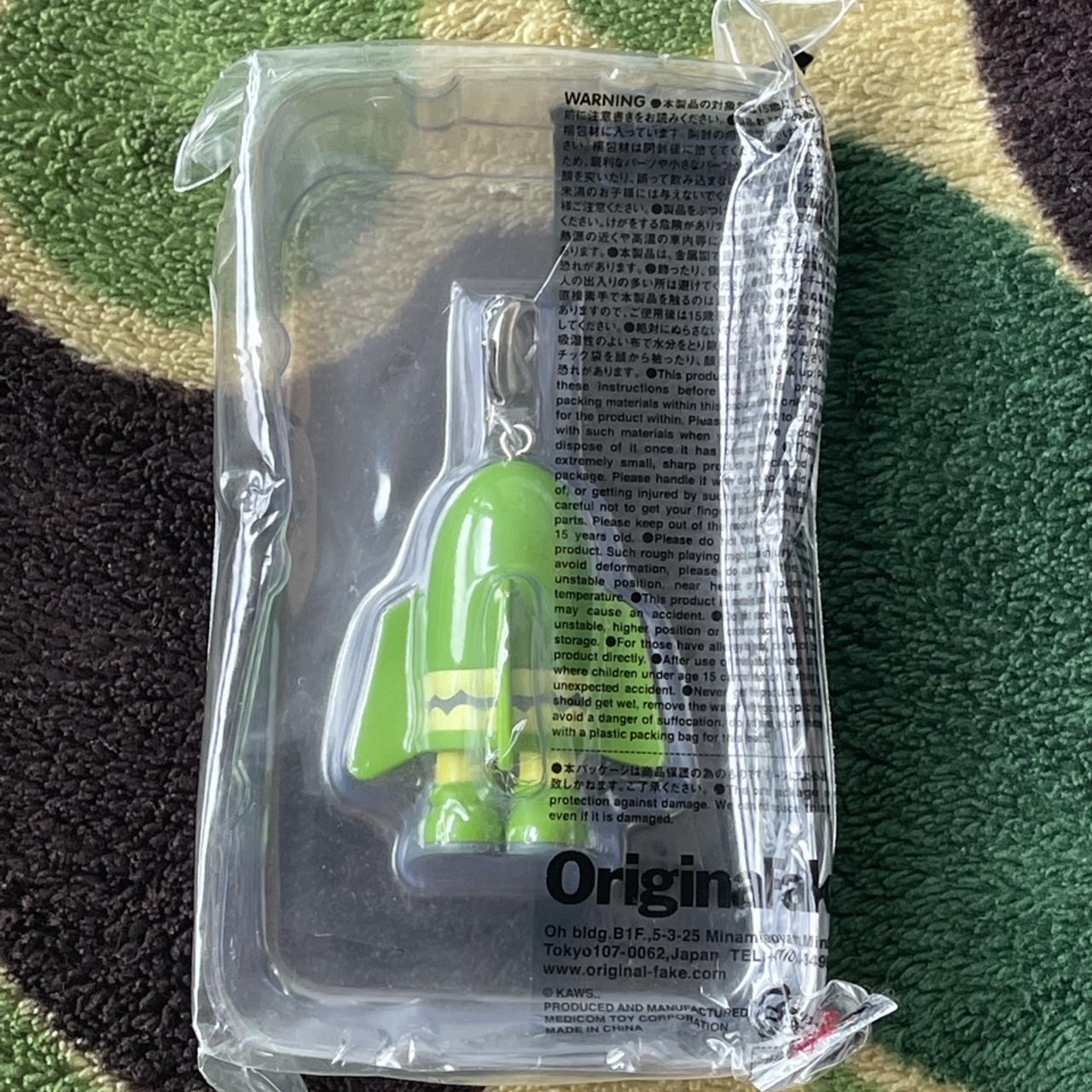 Kaws Blitz keychain 100% New very rare - Depop