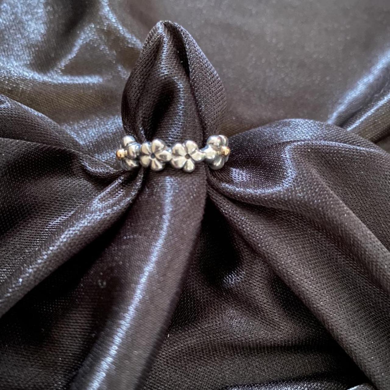 Pretty flower discontinued Pandora ring in gold and... - Depop