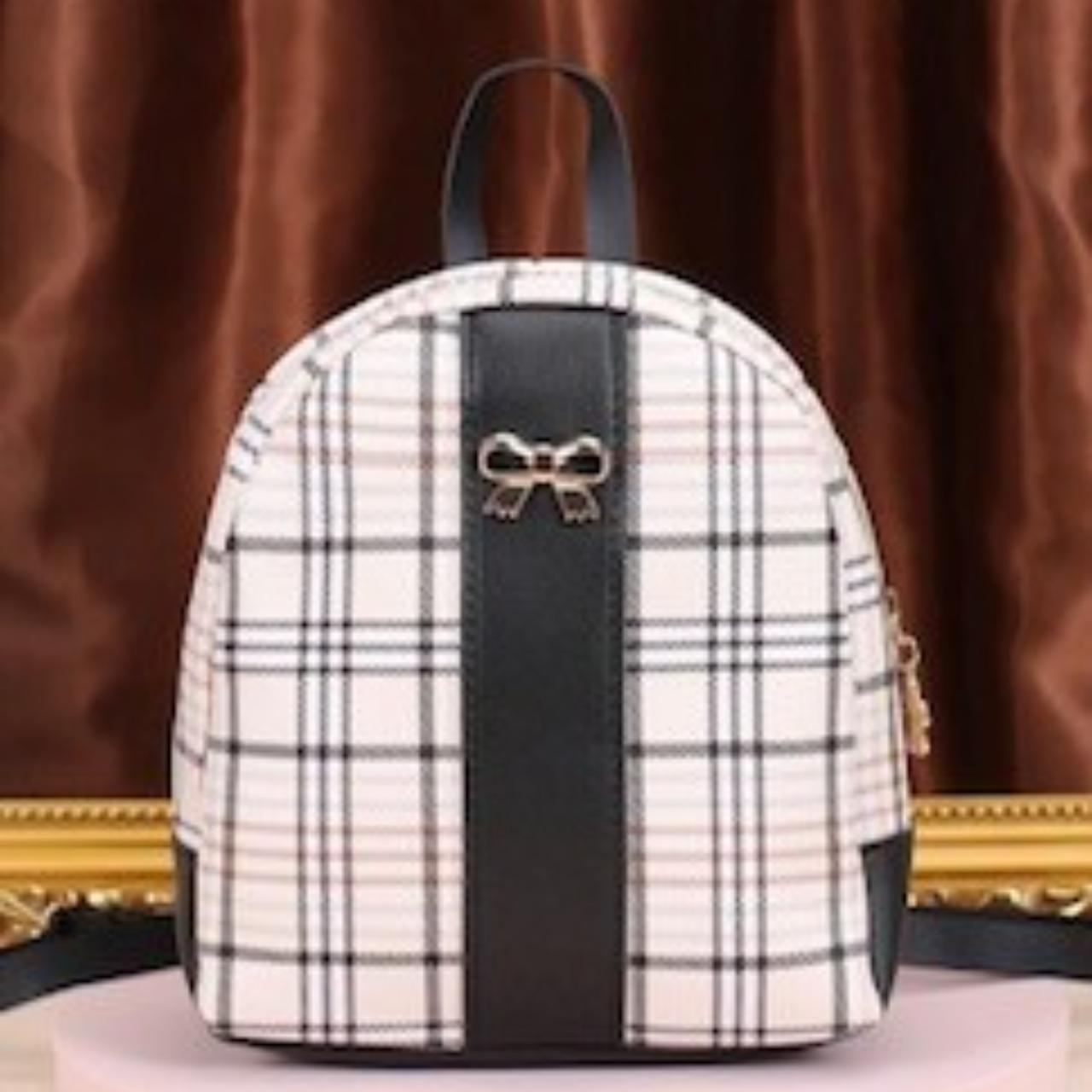 Black and cream checkered mini backpack with... - Depop