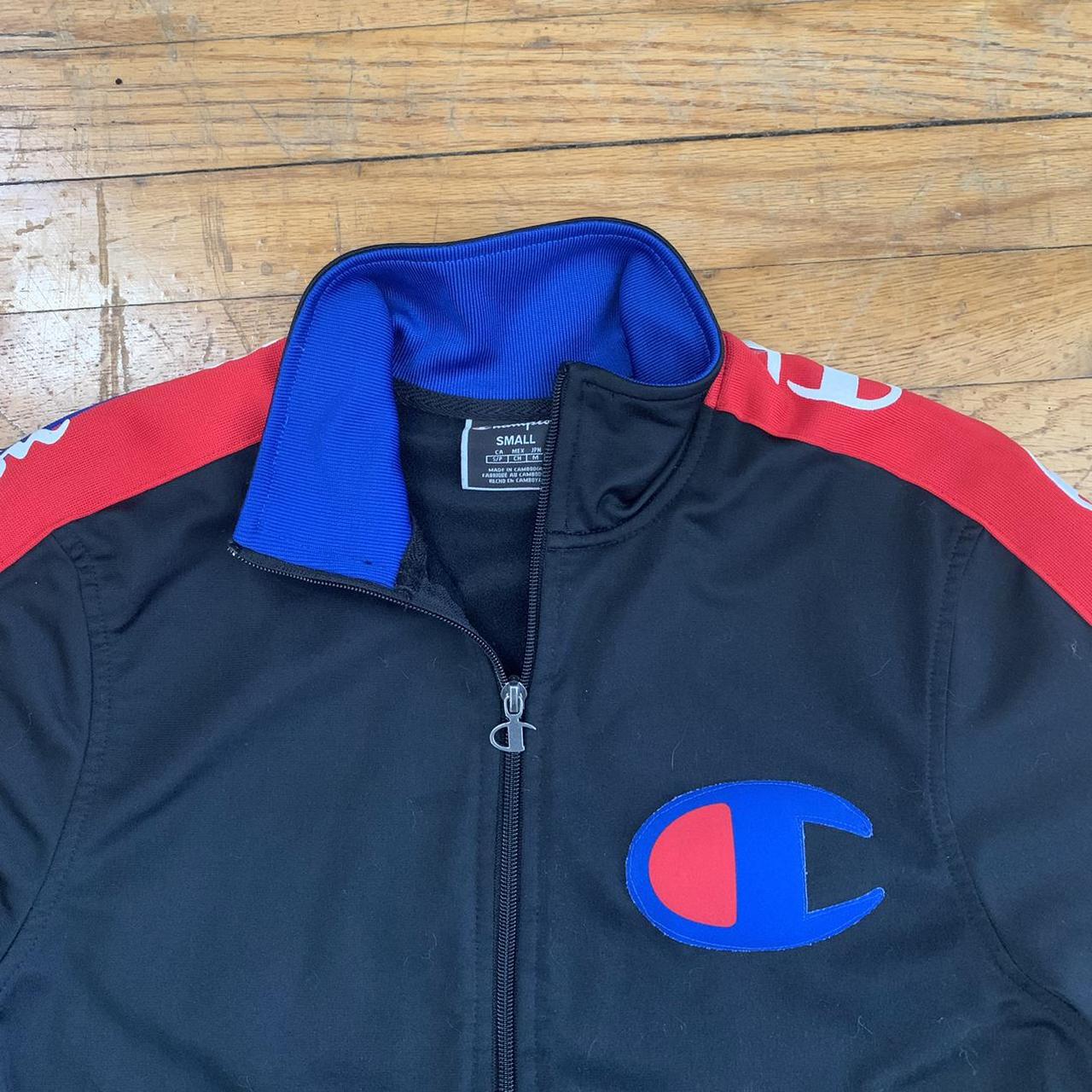Champion Black Blue and Red Track Jacket Good... - Depop