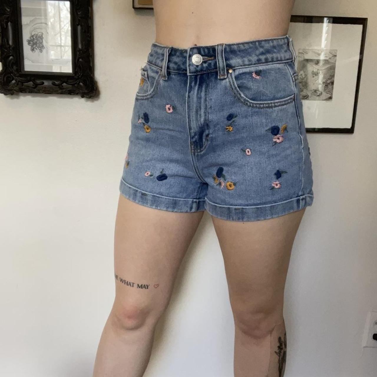 Flower embroidered jean shorts. - Depop