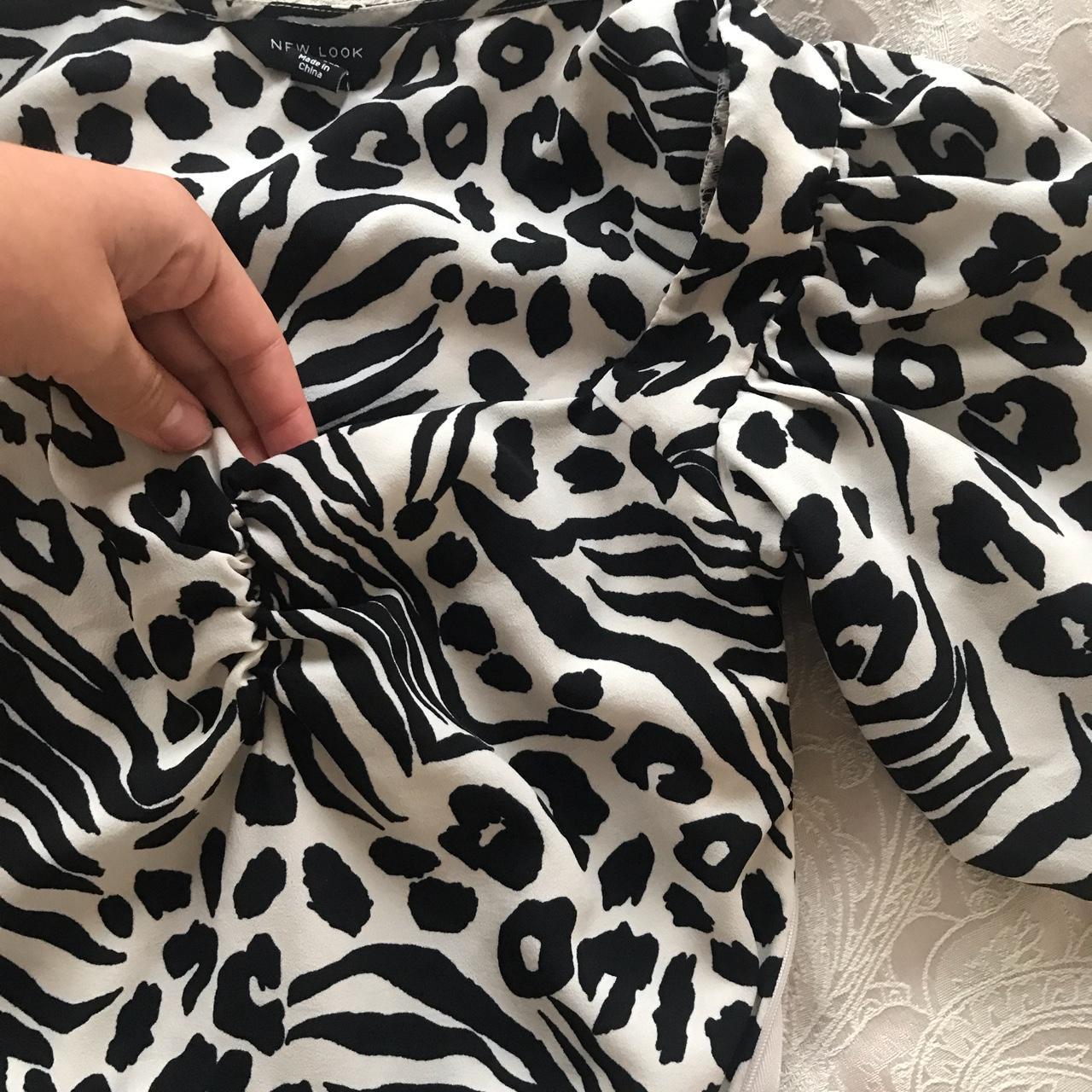 White and black animal print dress only worn once... - Depop