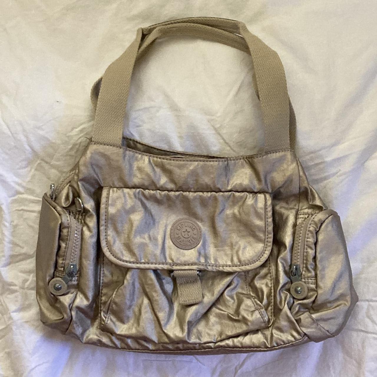 Kipling Women's Gold Bag | Depop