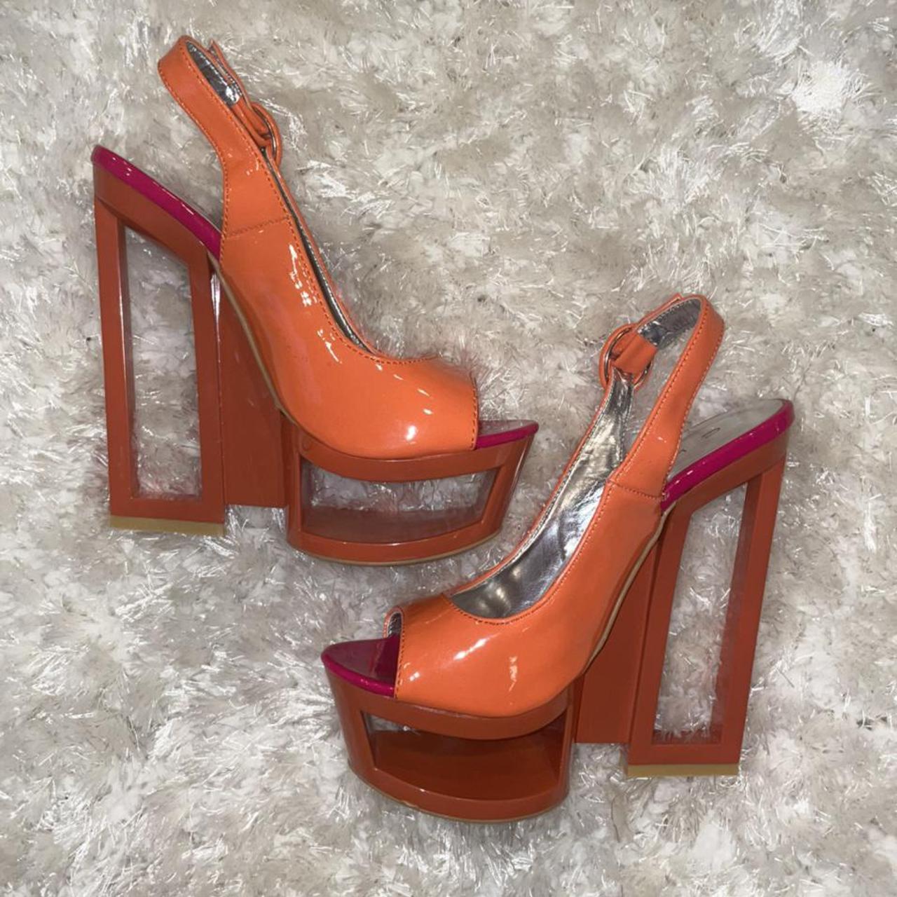 Iconic orange geometric heels!!! Unique hallowed out... - Depop