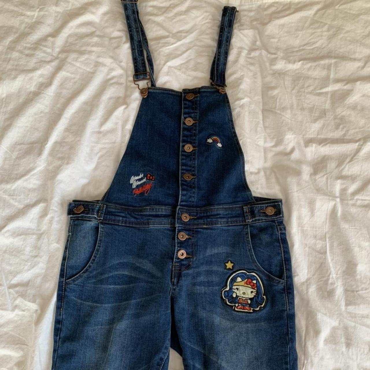 Hello kitty Wonder Woman overalls size medium... - Depop