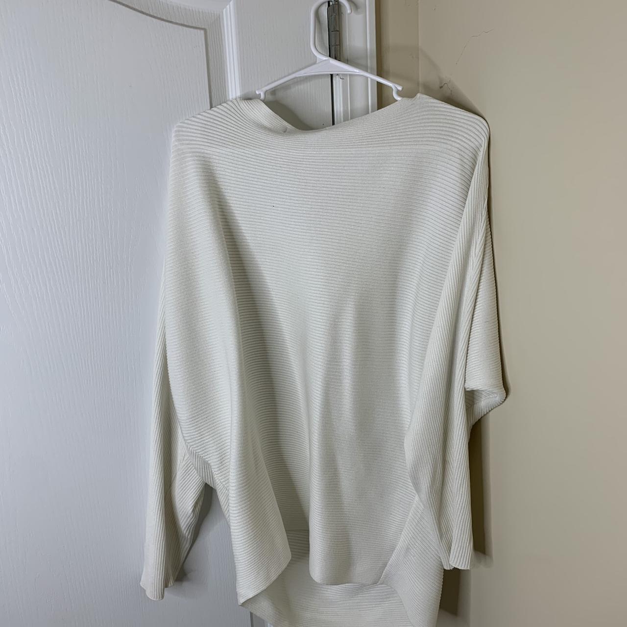 This soft , creame colored off the shoulder sweater... - Depop