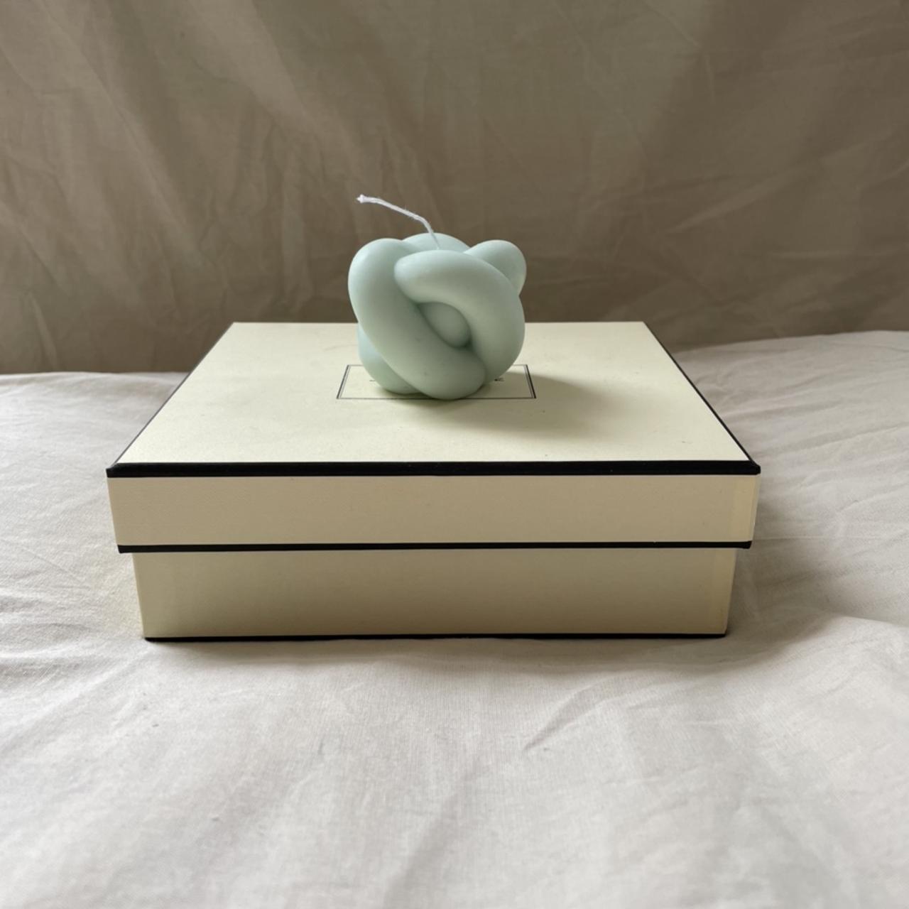 Handmade knot candle in sage green. Decorative,... - Depop