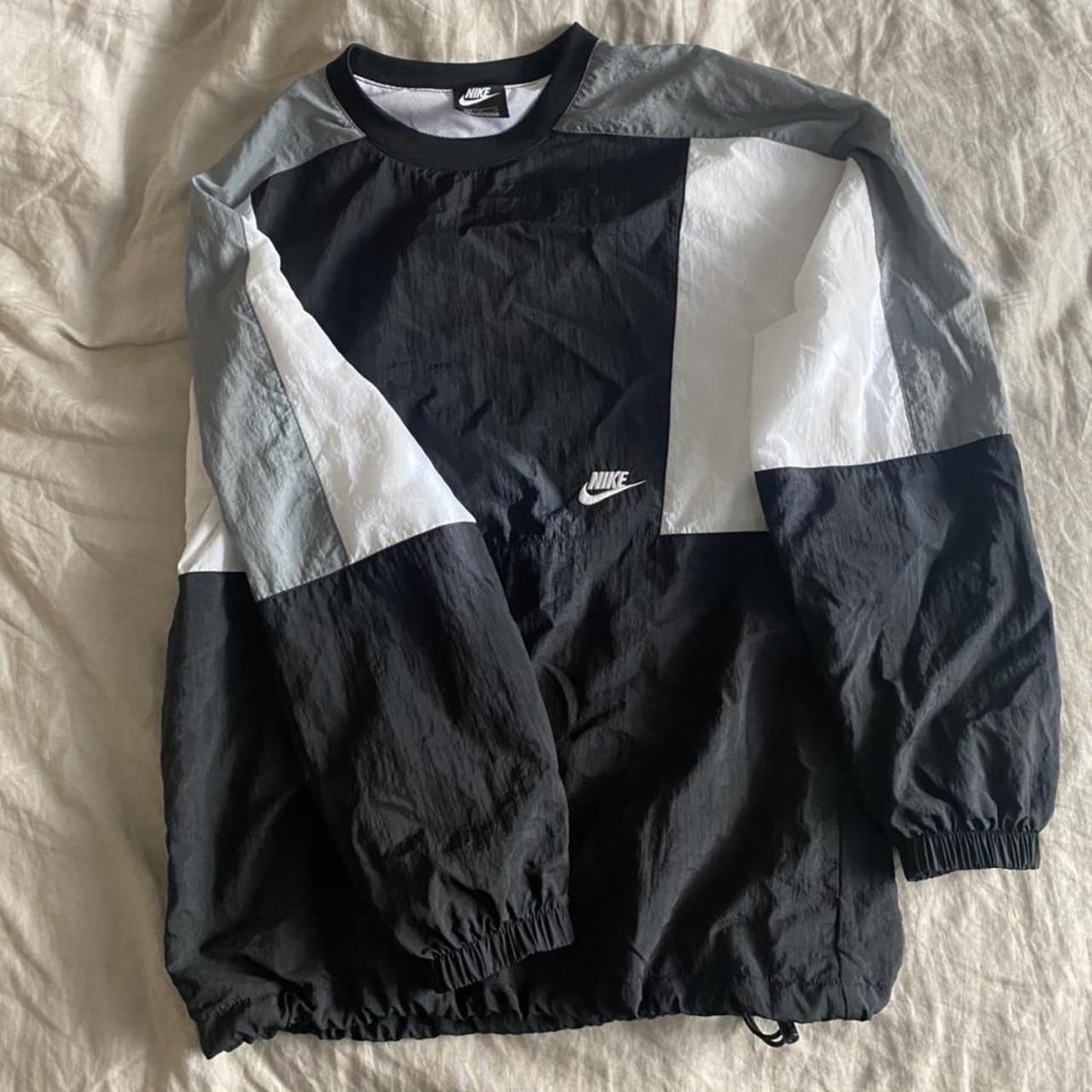 A Nike Sportswear Woven Color-Block Crew Sweater... - Depop