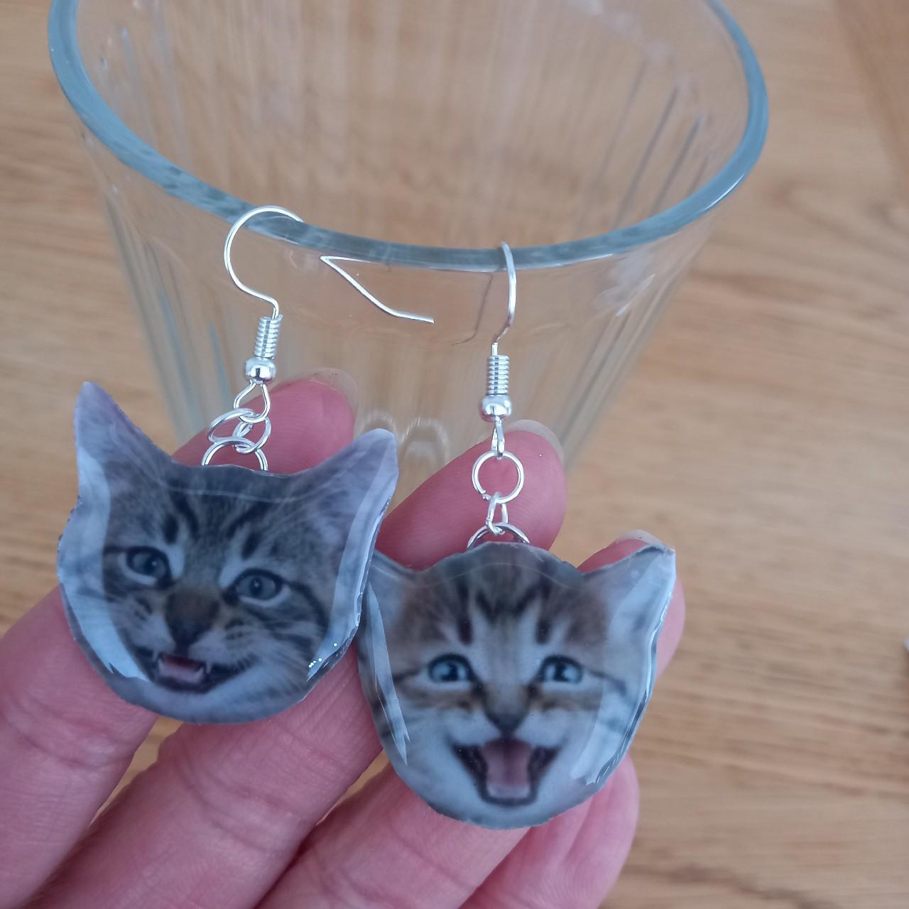 Resin smiling cat face earrings, approximately 3... - Depop