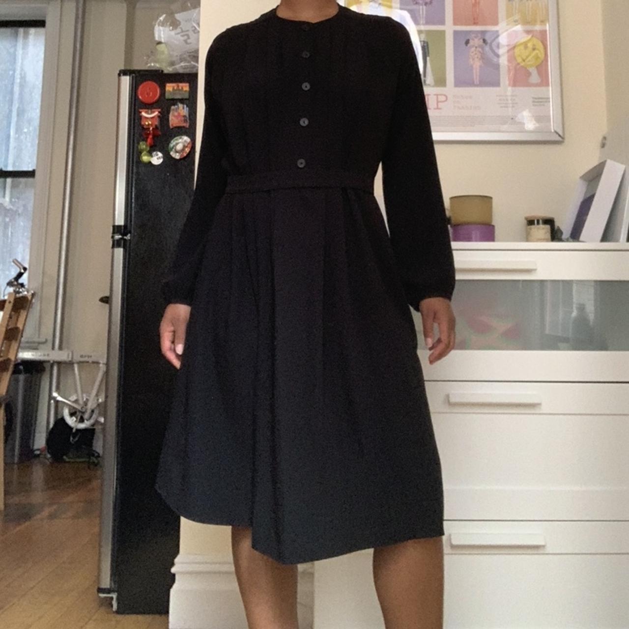 This long black dress is an unique collab between... - Depop
