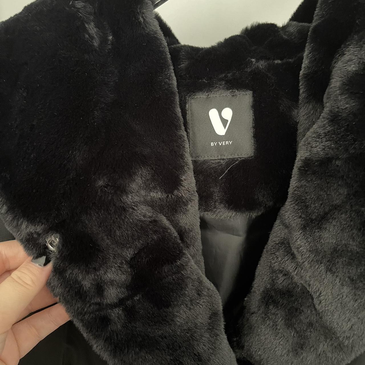 Very coat. Fluffy inner lining making it super cosy... - Depop
