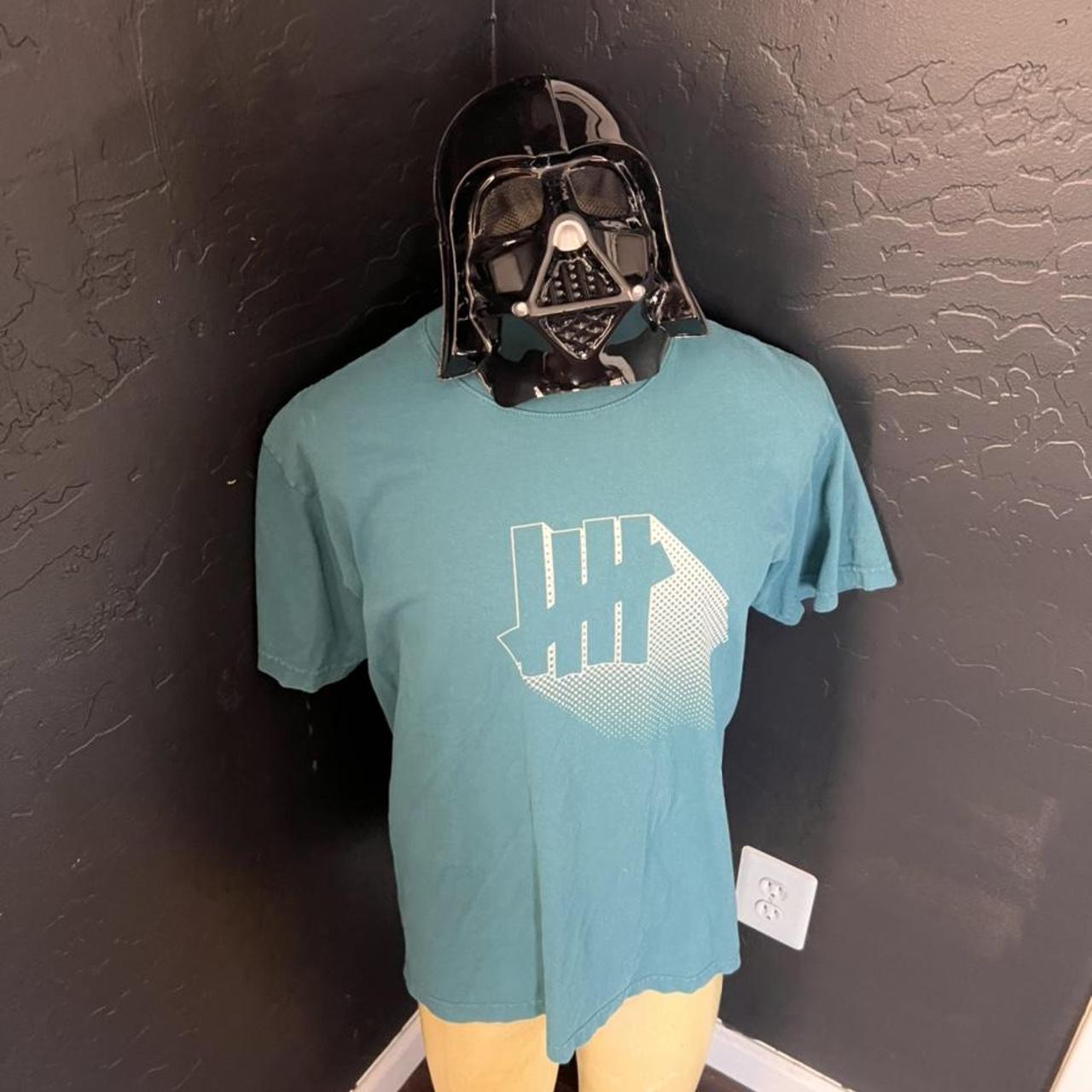 Undefeated Men's Blue T-shirt | Depop