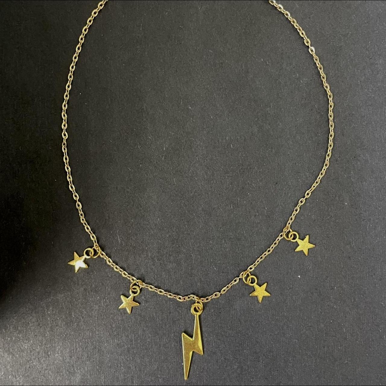 Lightning bolt and star gold chokers Super cute... | Depop