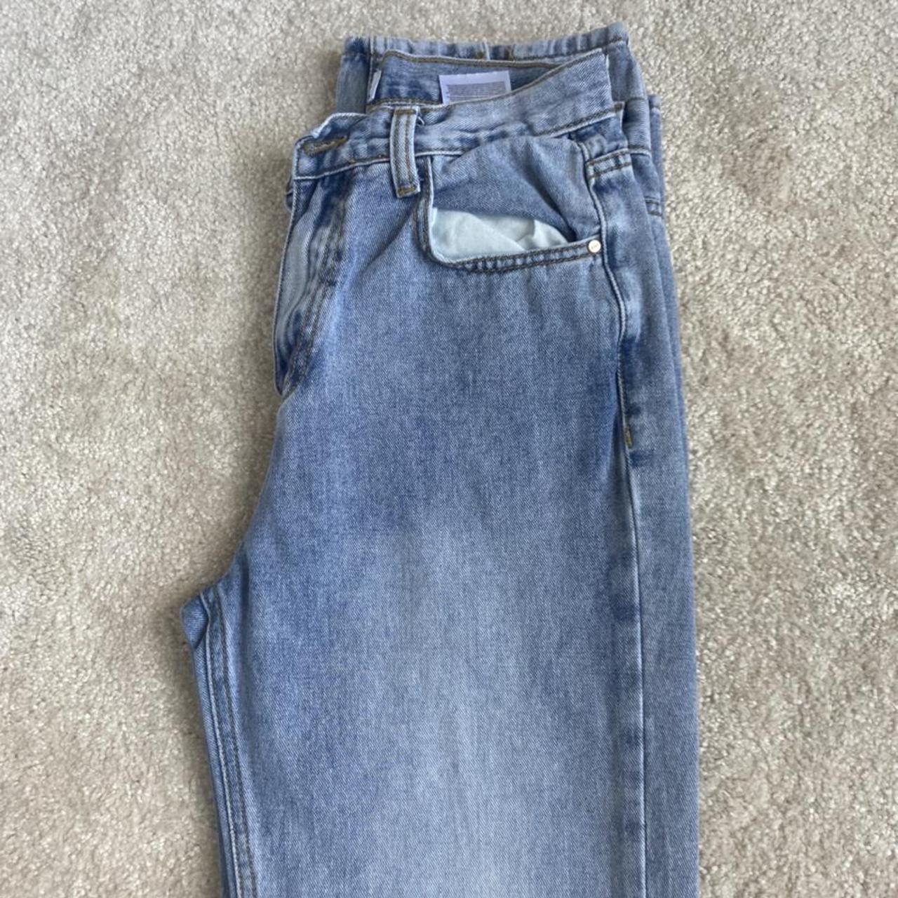 Blue jeans with front split. Gorg jeans only worn... - Depop