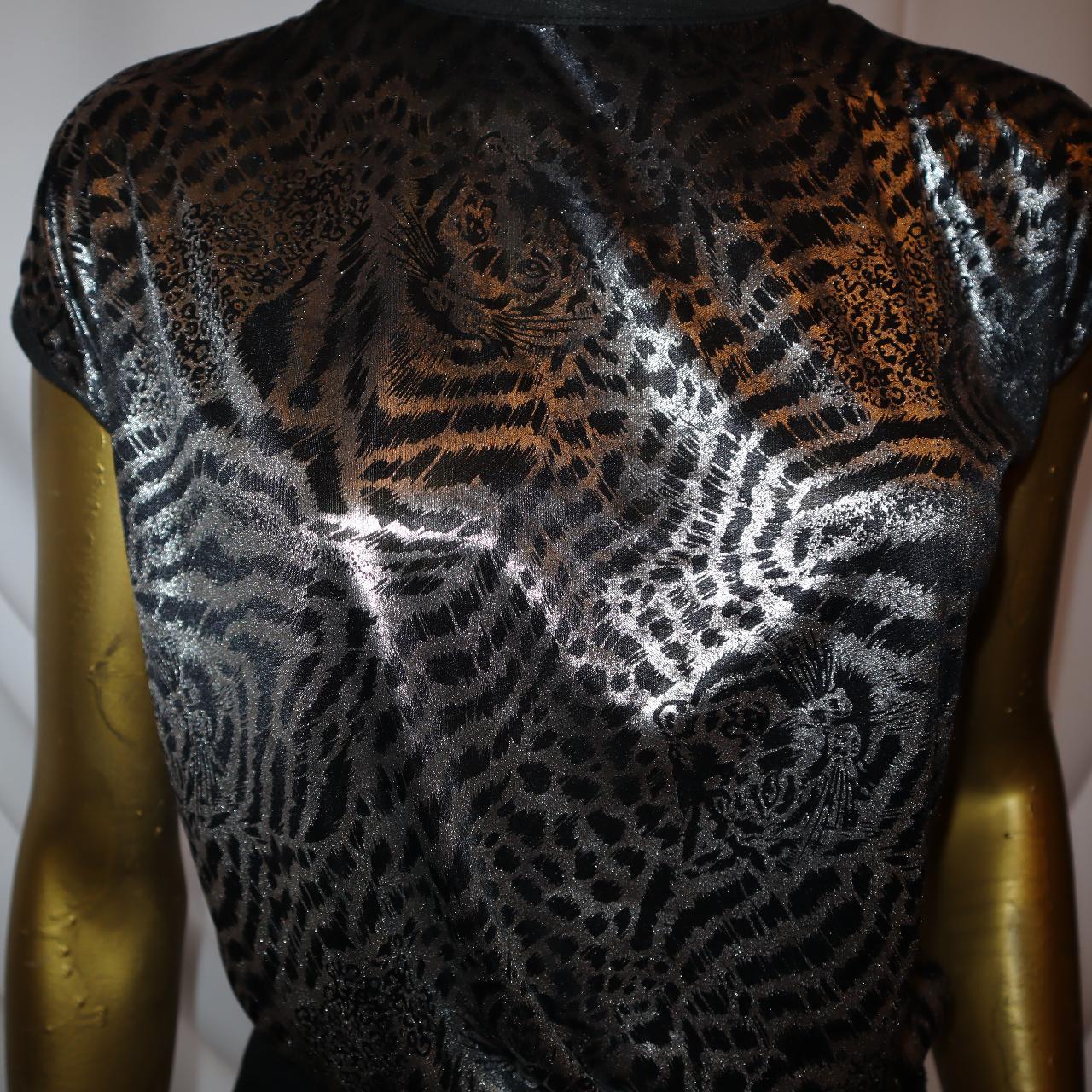 Vintage Dunlop metallic silver leopard print... - Depop