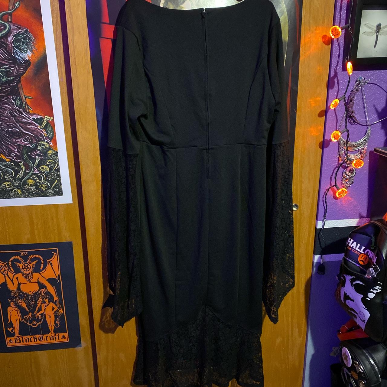 New, only tried on. Elvira inspired Hot Topic dress.... - Depop