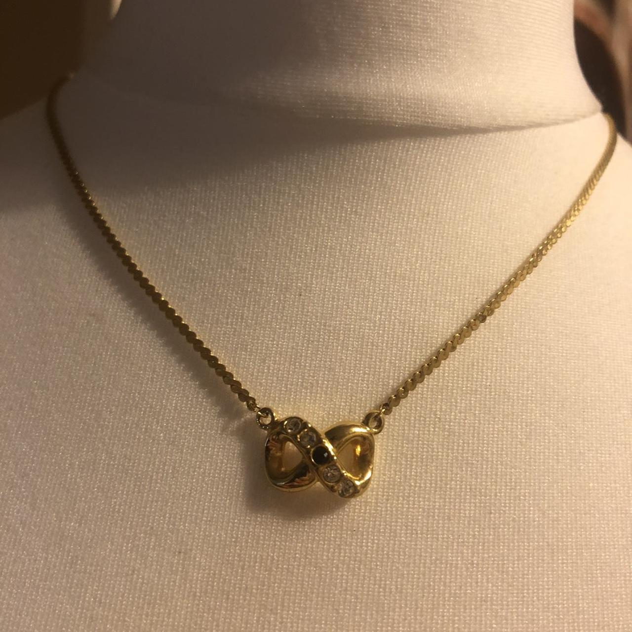 Y2k gold infinity necklace. Super pretty and shiny... - Depop