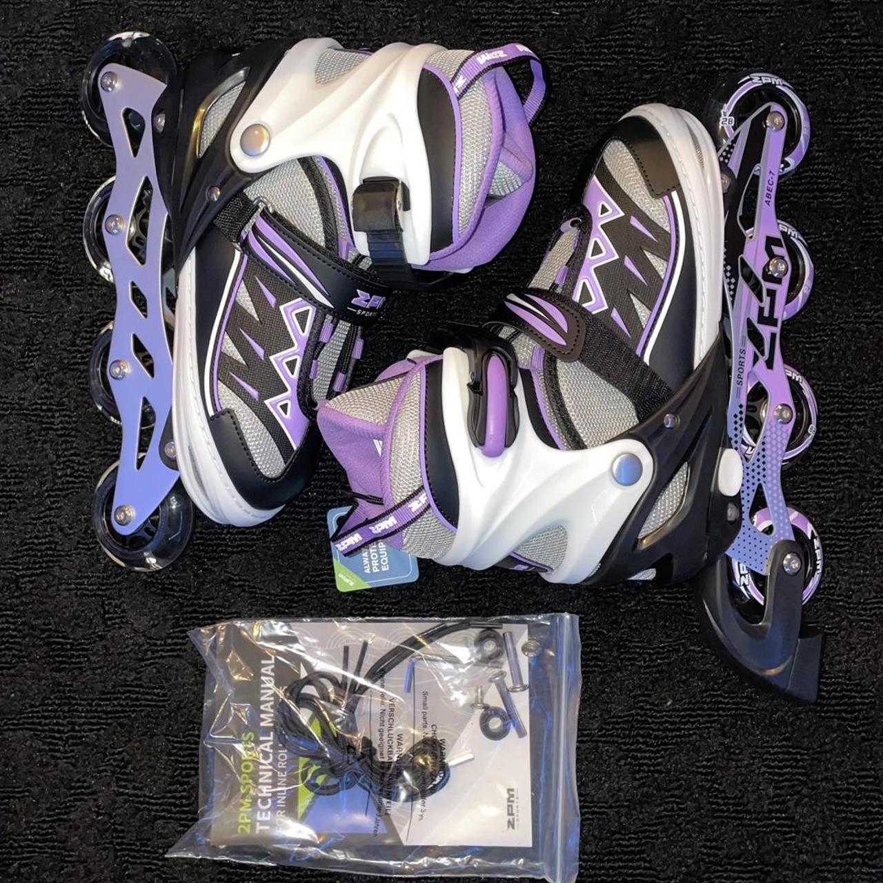 Purple adjustable inline skates with light up... - Depop