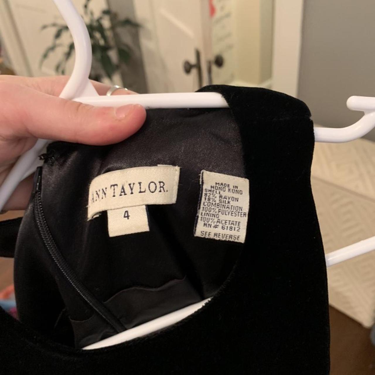 all black velvet Ann Taylor dress with a slight slit... - Depop