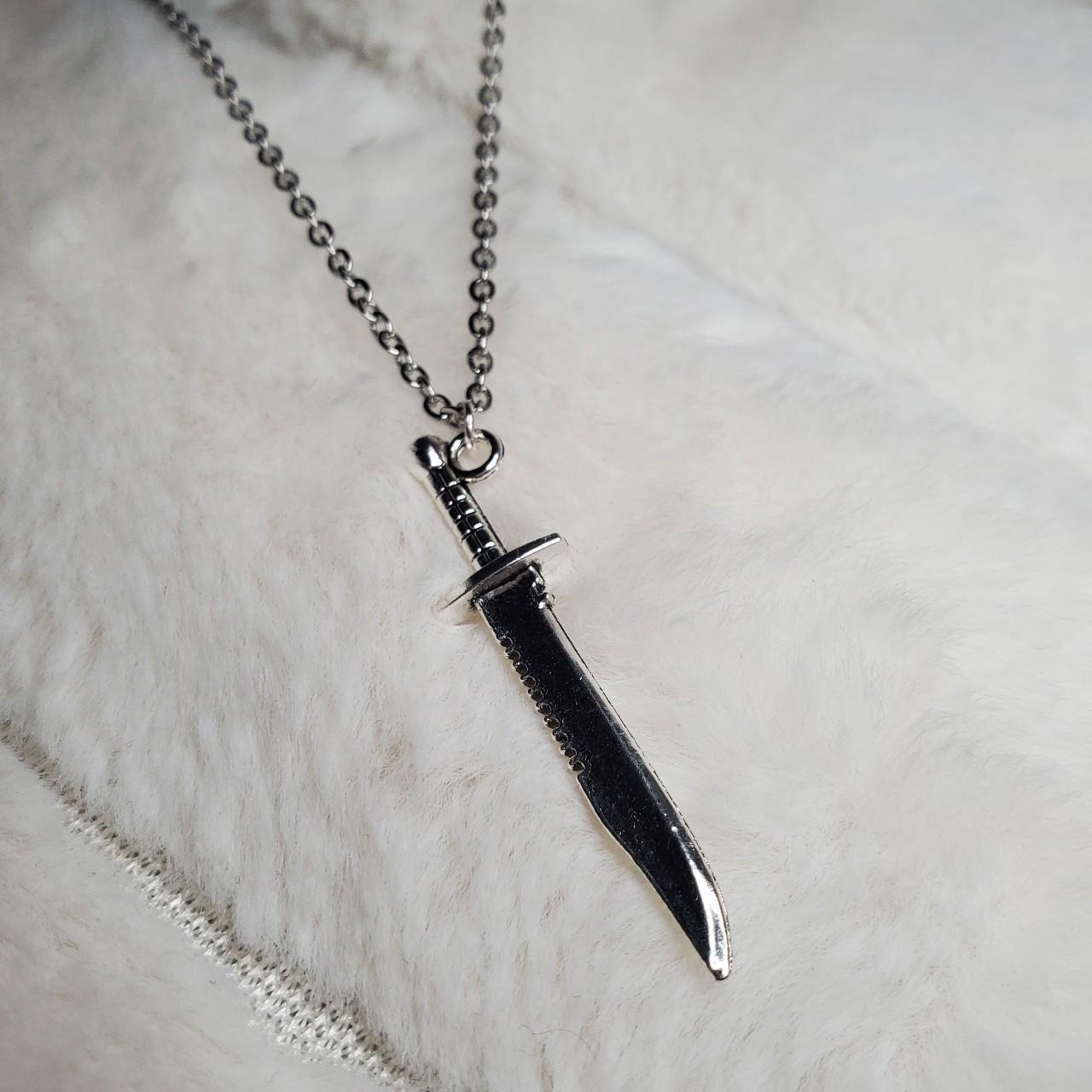 Silver sword pendant. Pendant measures... - Depop