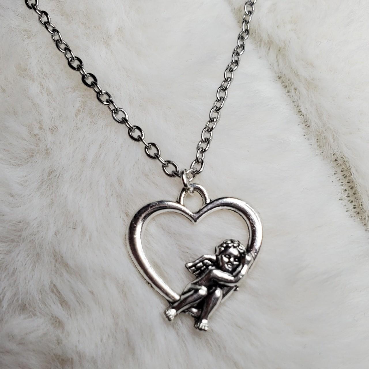 Cupid heart charm necklace. These pendants measure... - Depop