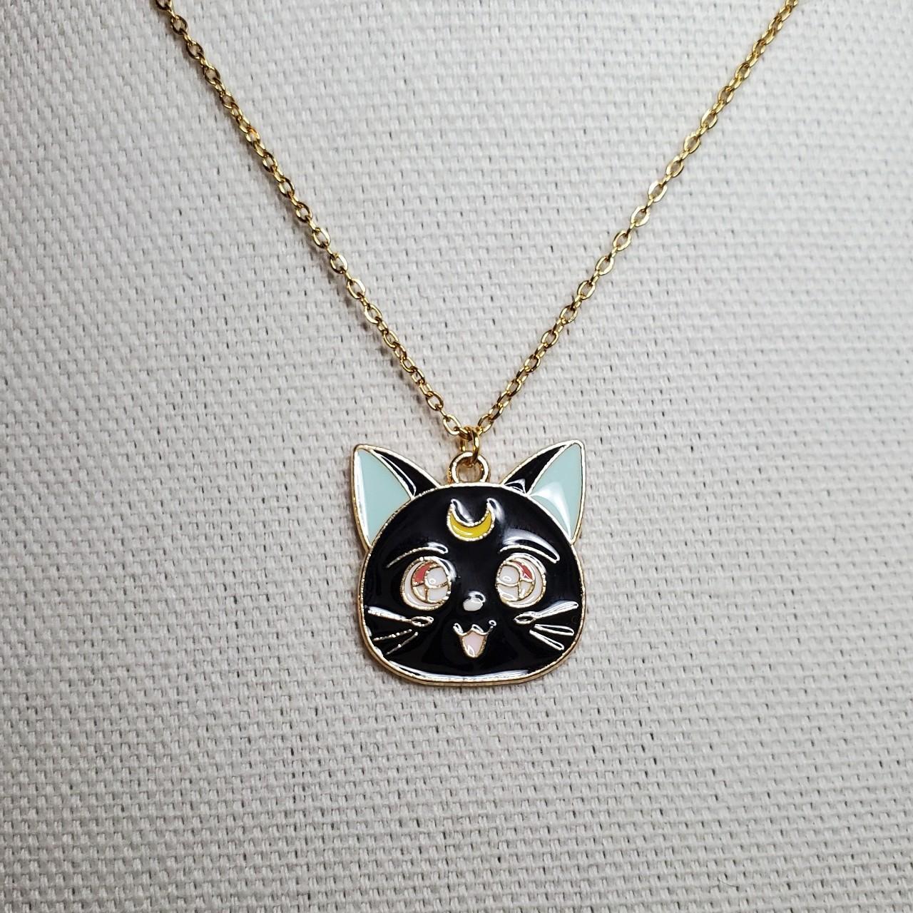 Gold accented Luna from Sailor Moon cat... - Depop