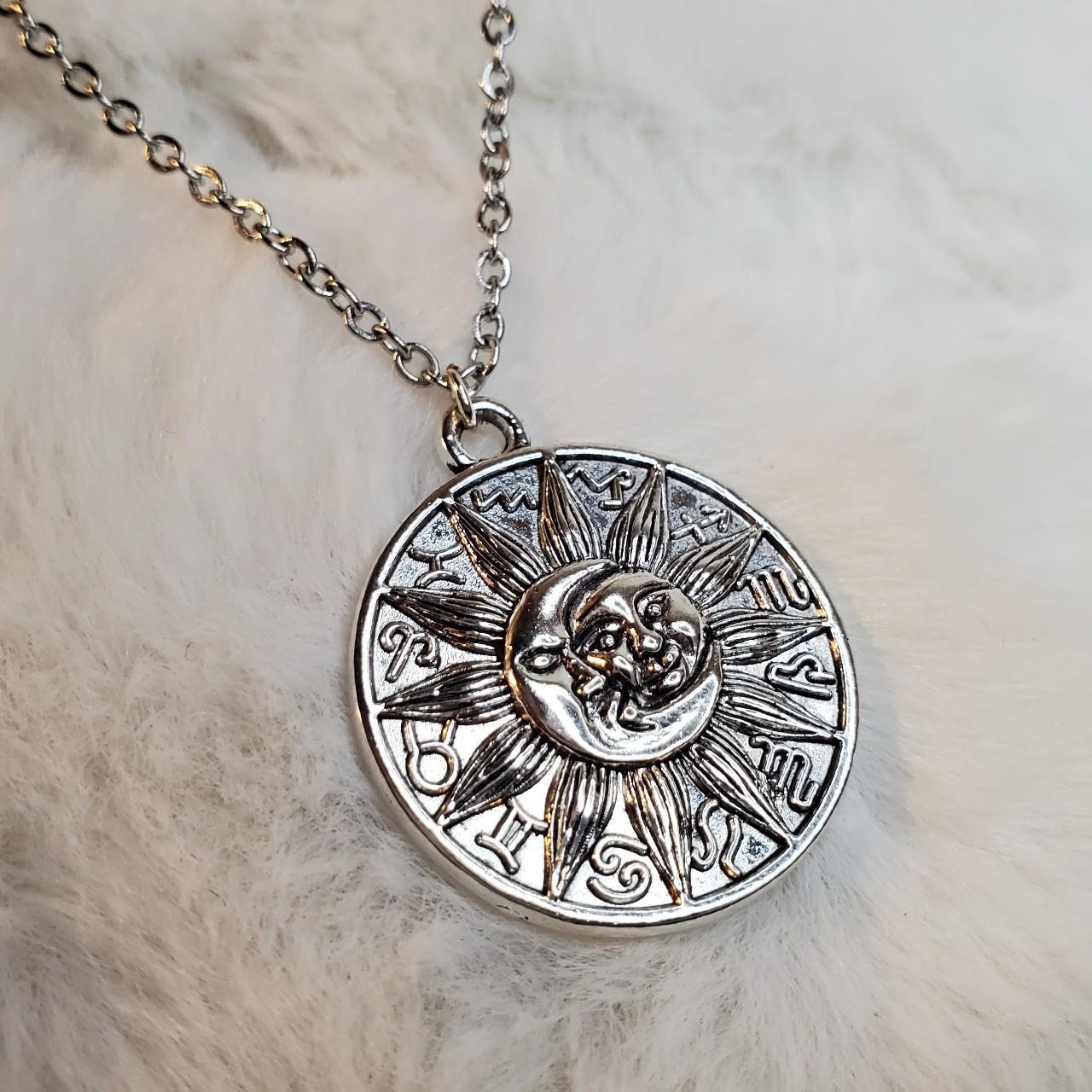 Moon and sun star sign horoscope charm... - Depop