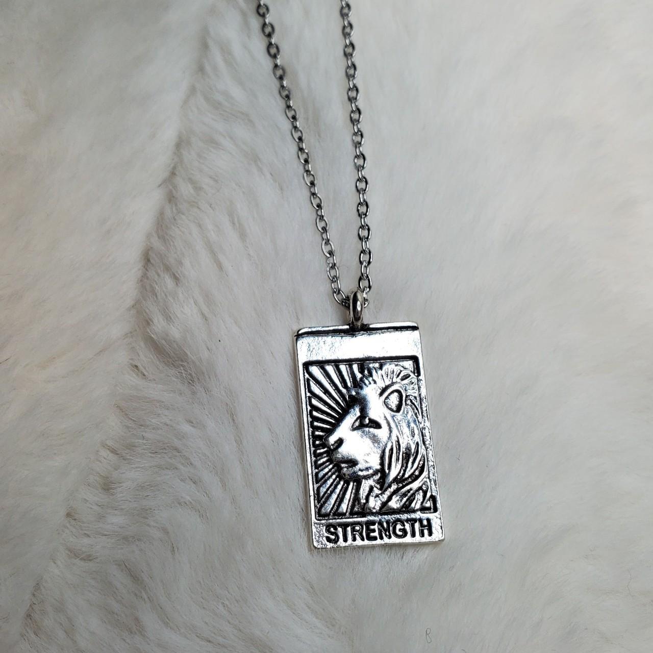 Strength tarot card charm necklace. Charms are... - Depop
