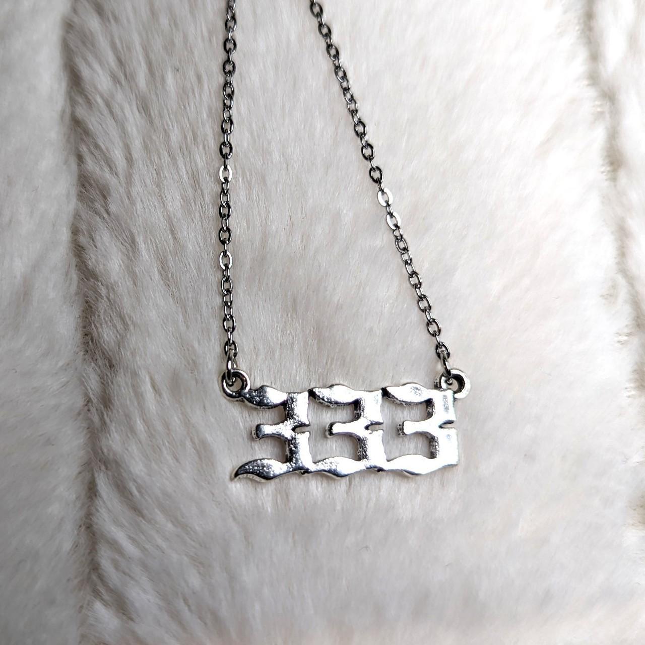 Lucky number 333 charm necklace. Comes on a 16 inch... - Depop