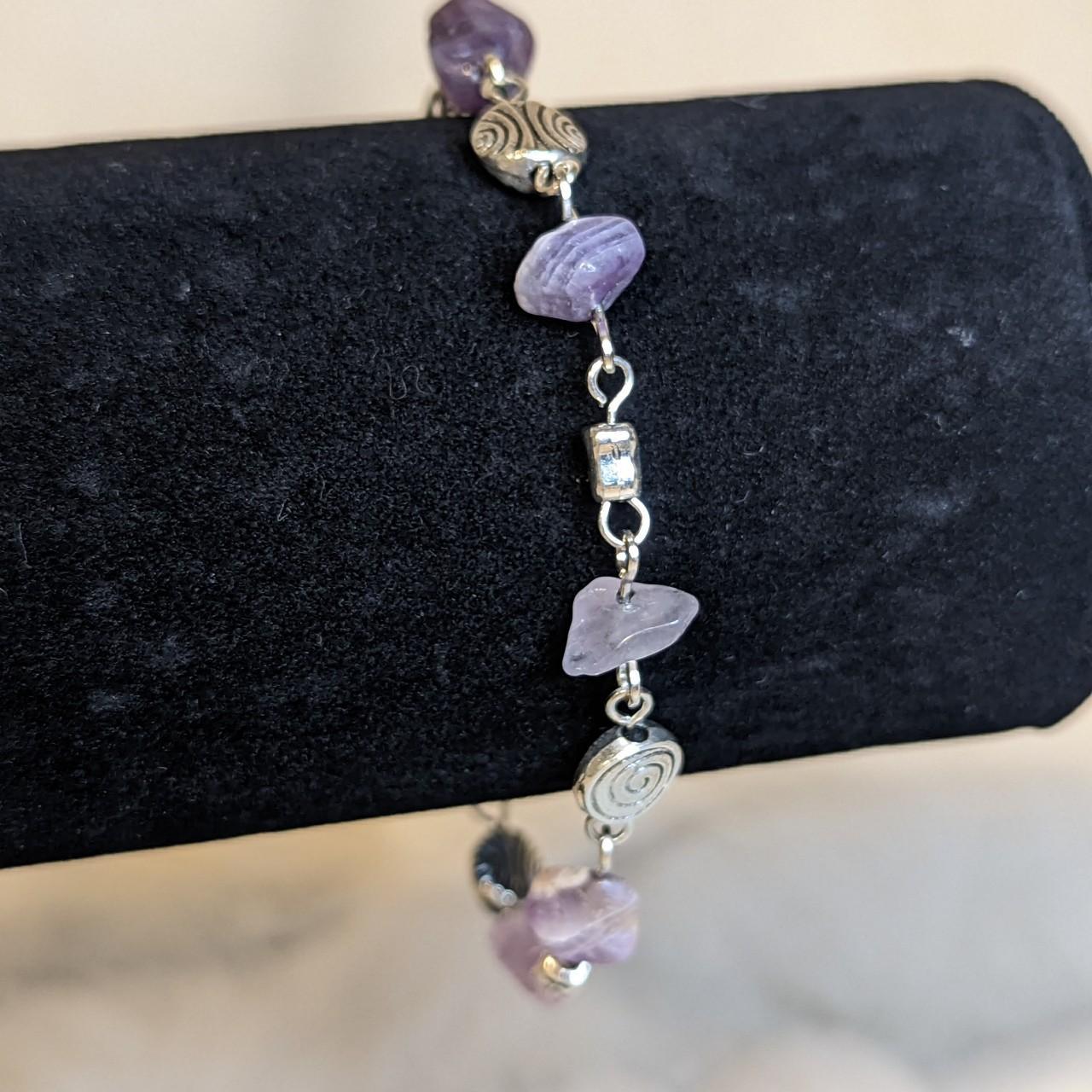 Amethyst bracelet with silver spiral accent... - Depop