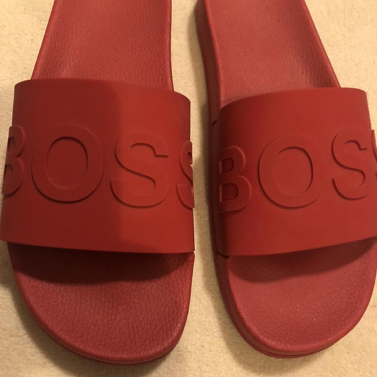 Boss mens red rubber sliders size 11. Worn once... - Depop