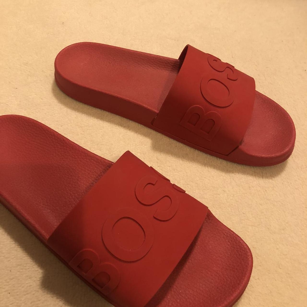 Boss mens red rubber sliders size 11. Worn once... - Depop